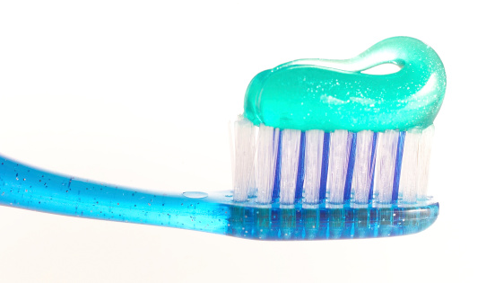 Toothpaste brush store